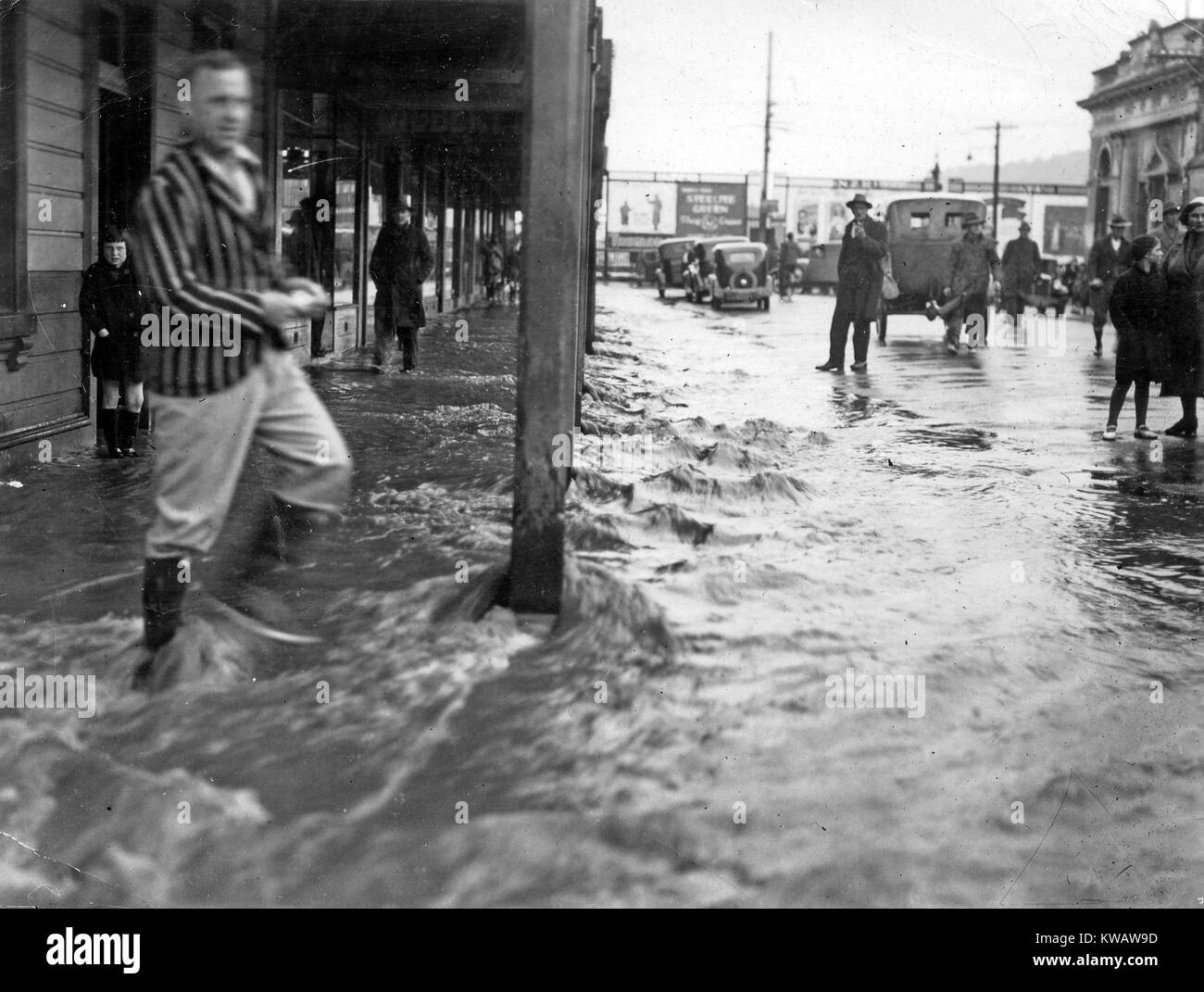 Man wading flood hi-res stock photography and images - Alamy