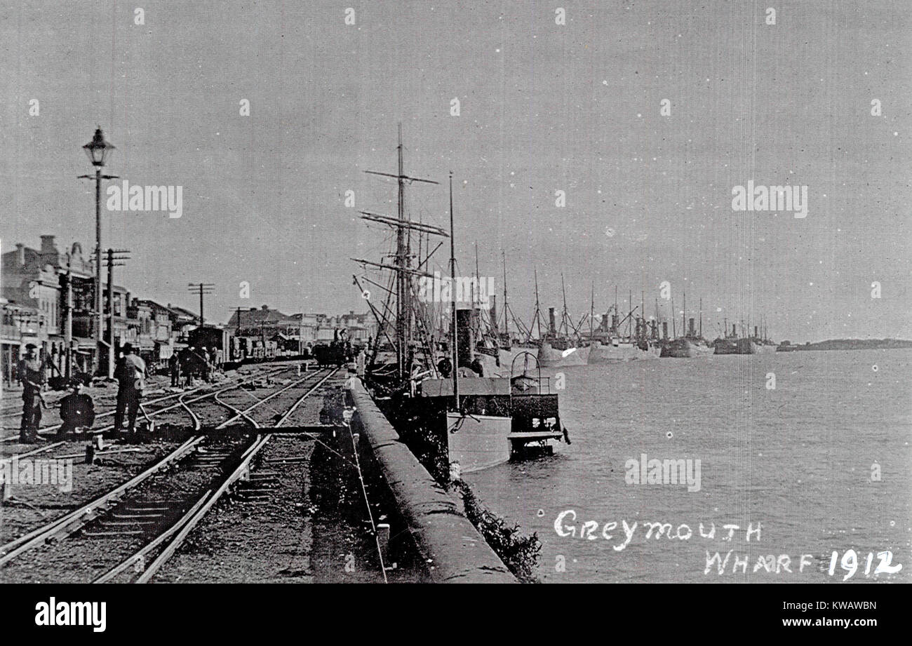 Men working near Greymouth wharf, 1912, Westland, New Zealand. The ...