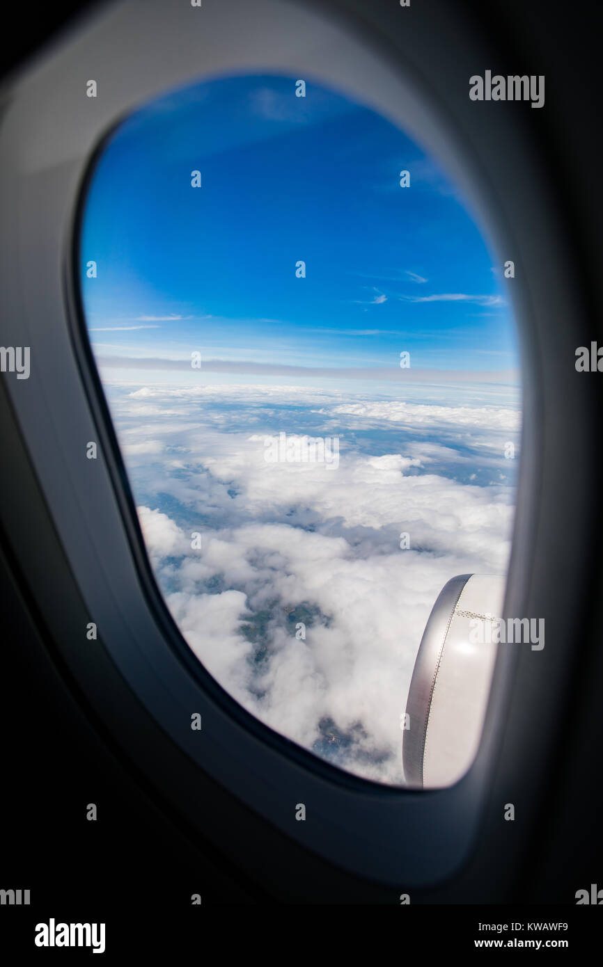 blue sky white cloud ,looking through airplane window frame Stock Photo ...