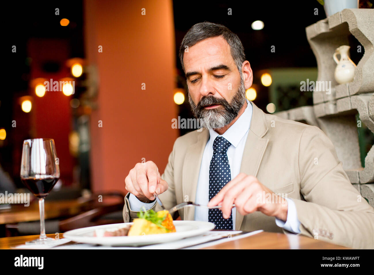 Old man eating alone hi-res stock photography and images - Alamy