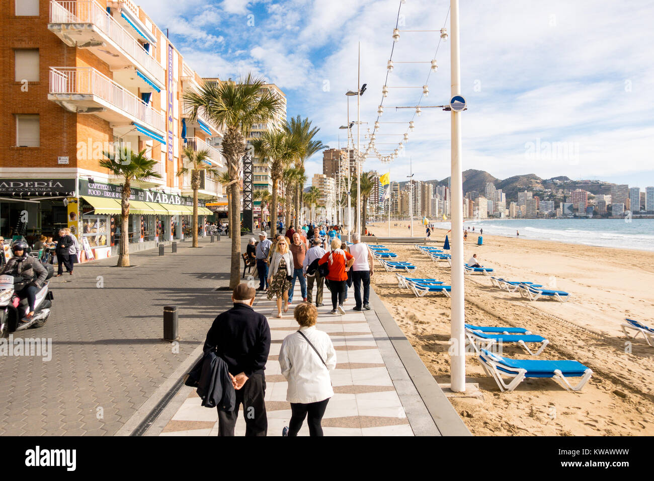 People walking on the embankment of Benidorm, Spain Stock Photo - Alamy