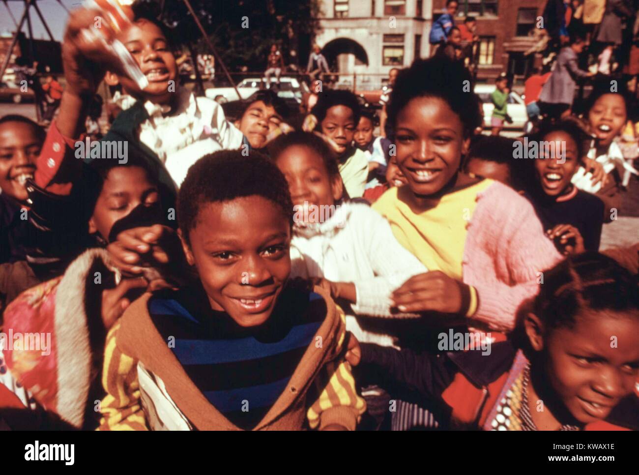 A group of children play at a playground at 40th and Drexel Boulevard ...