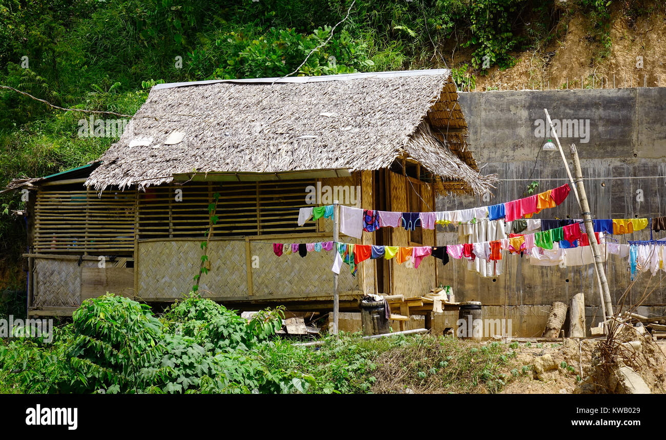 A rural house with many dried clothes in Palawan, Philippines. Palawan ...