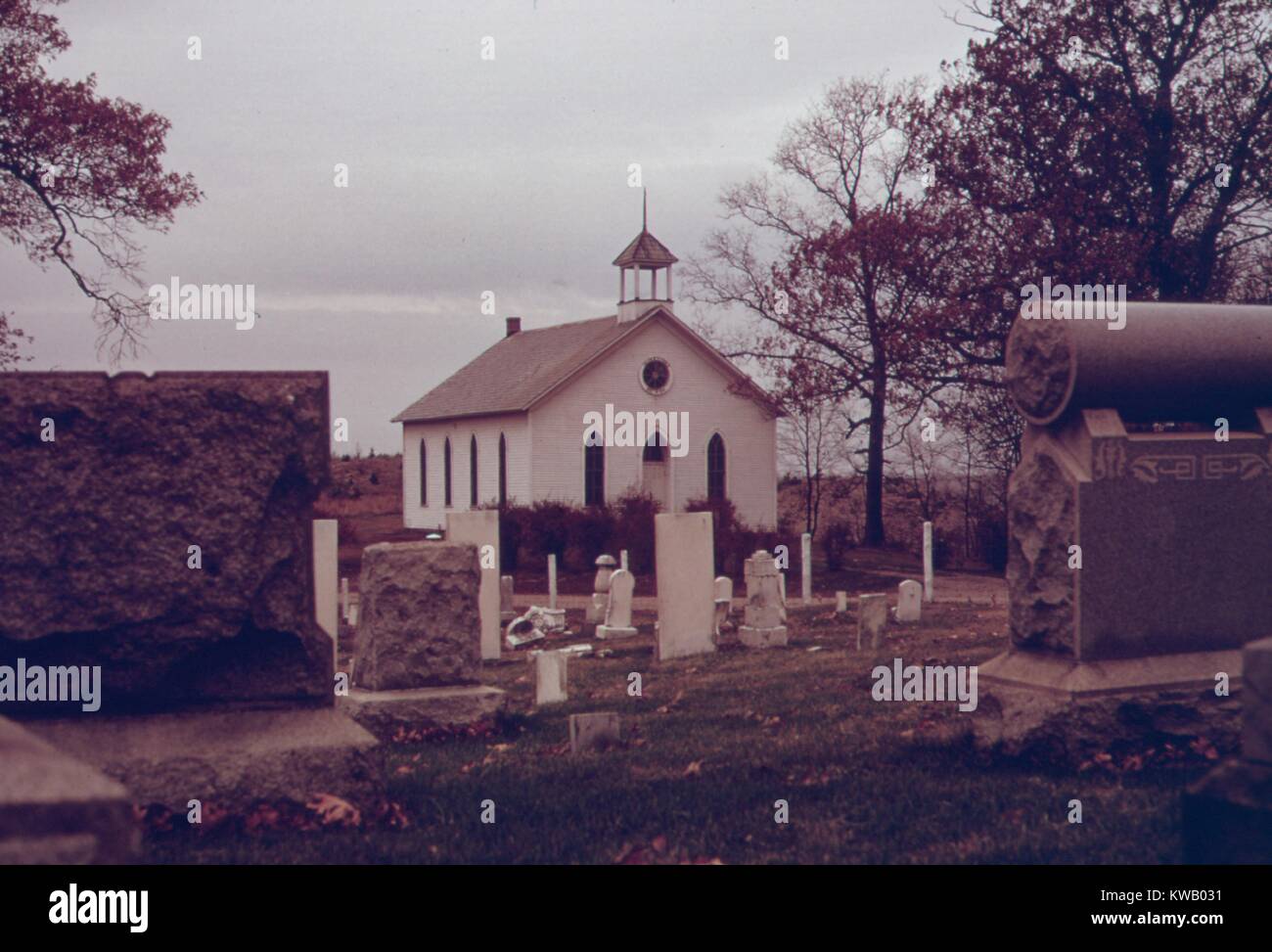 Old graves in front of a small rural church, Ohio, USA, October, 1973 ...