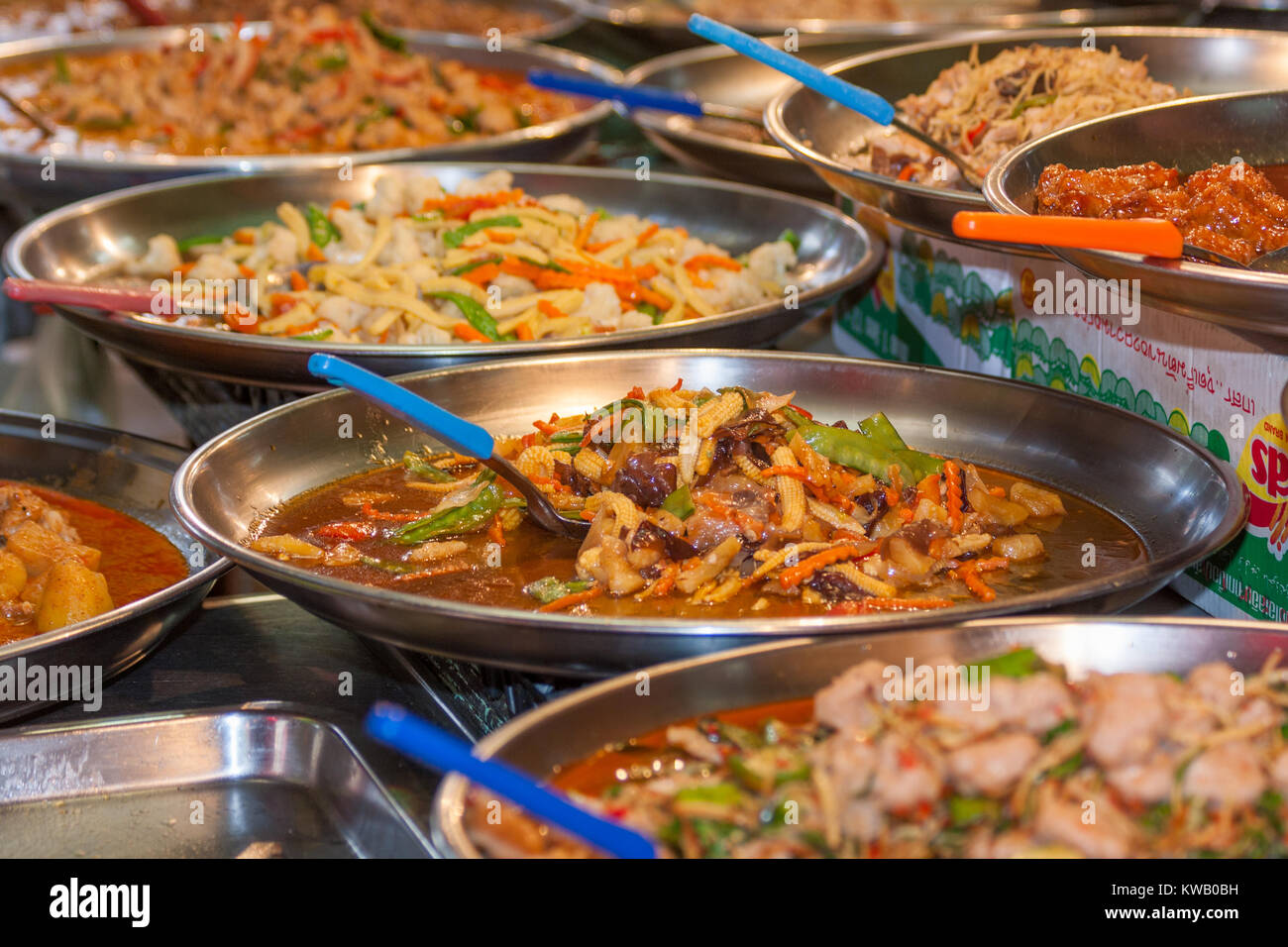 Platters of Thai food on a street food stall, Bangkok, Thailand Stock ...