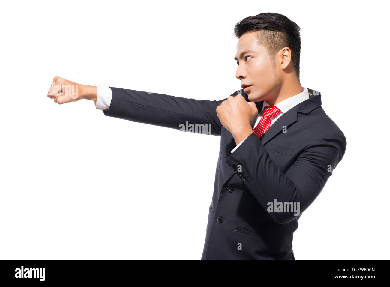 Young asian businessman ready to fight isolated on white Stock Photo ...