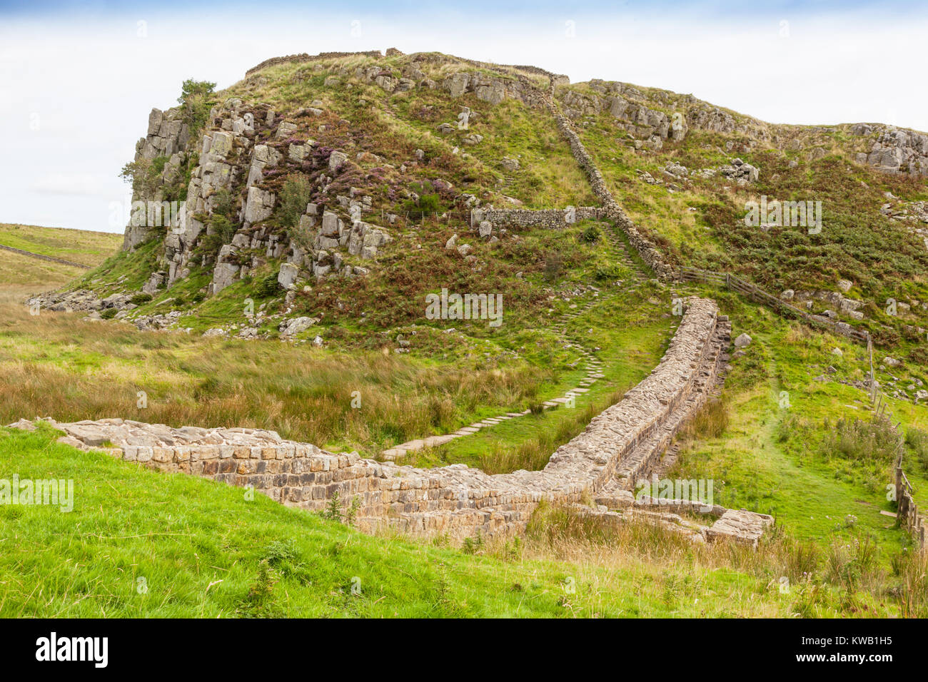 NORTHUMBERLAND, ENGLAND - AUGUST 31, 2012: A section of Hadrian's Wall ...
