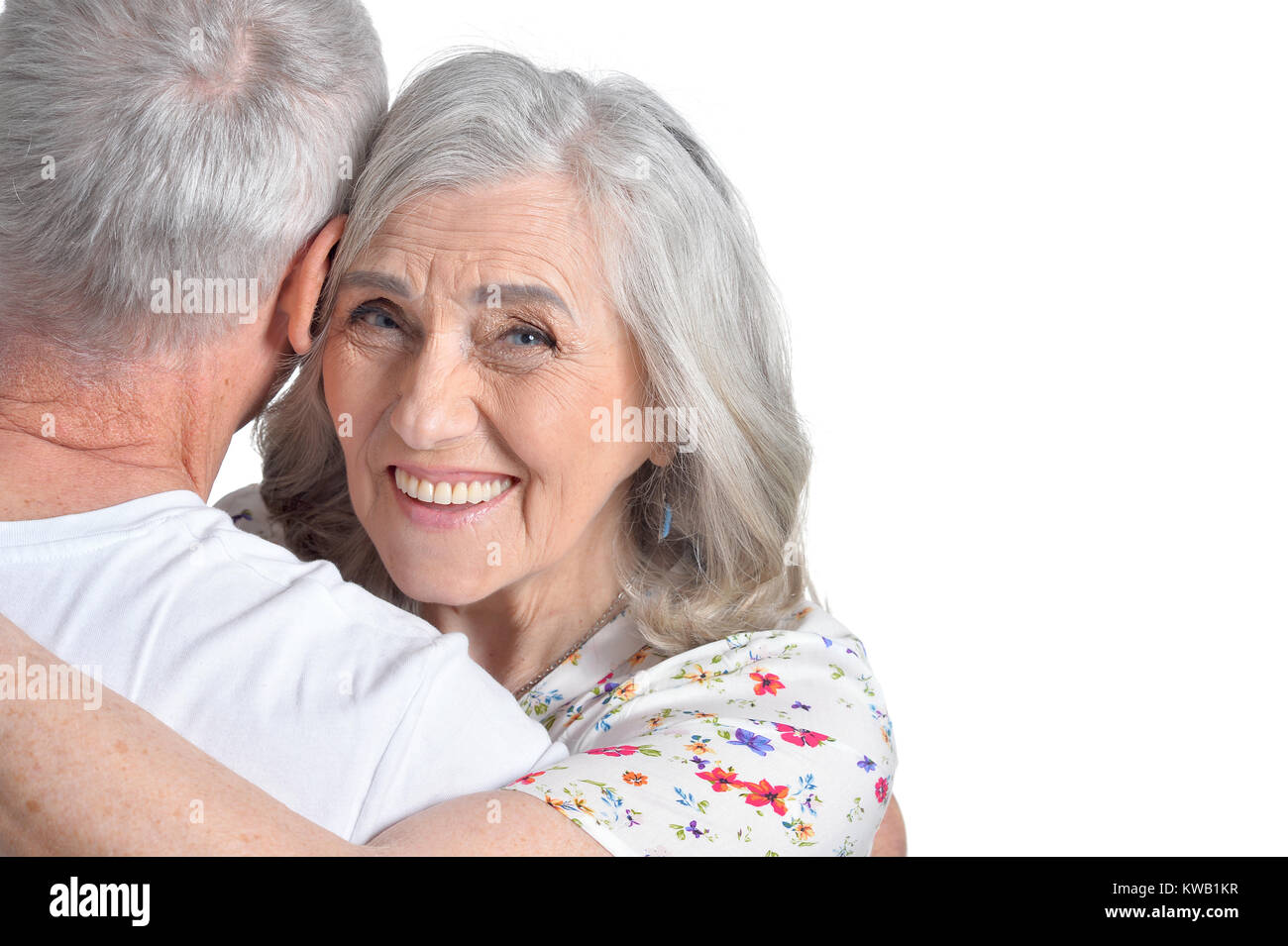 Portrait of hugging senior couple isolated Stock Photo - Alamy