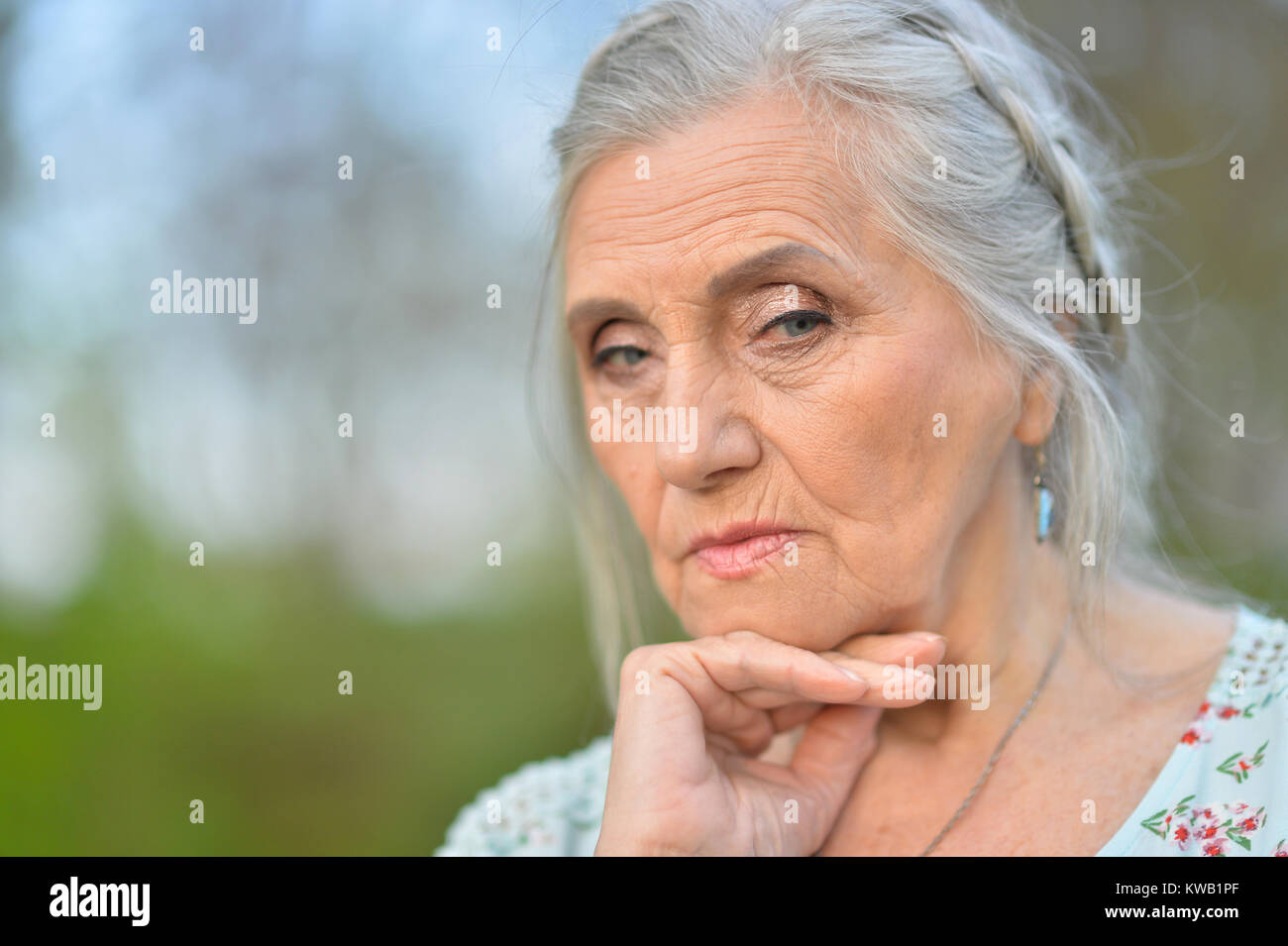 sad senior beautiful woman Stock Photo - Alamy