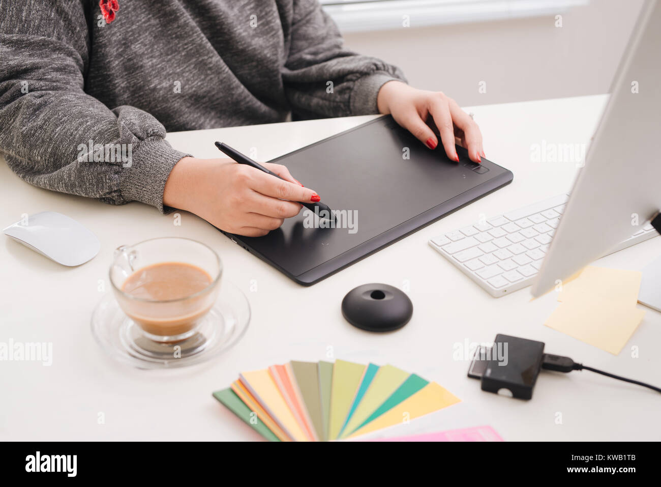 Interior designer hand working with new modern computer laptop and pro ...