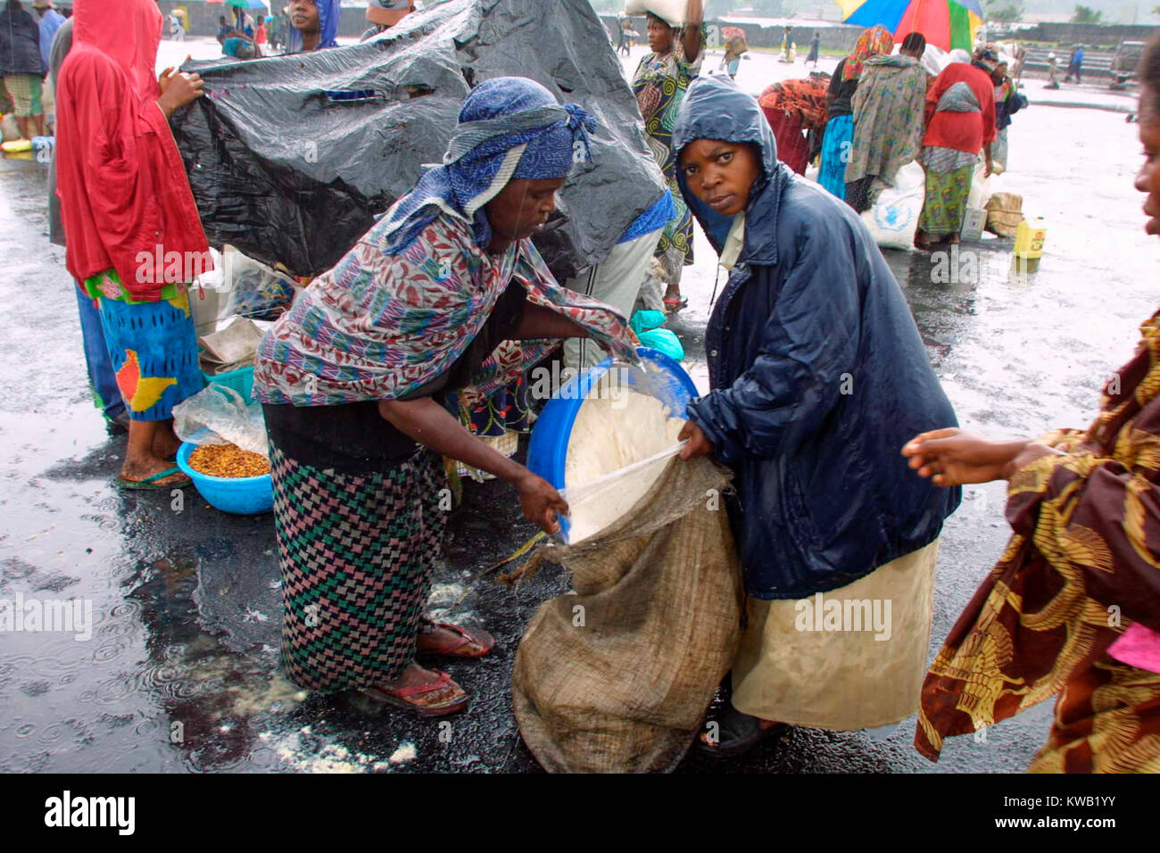 Distribution of food at the Stade de L'Unite in Goma for people in need ...