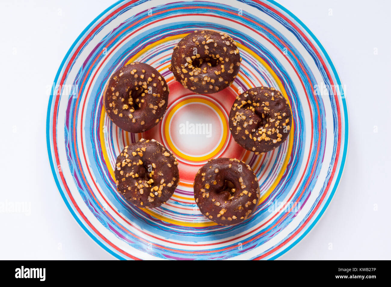 Mini ring doughnuts with a chocolate and orange flavour topping hi-res ...