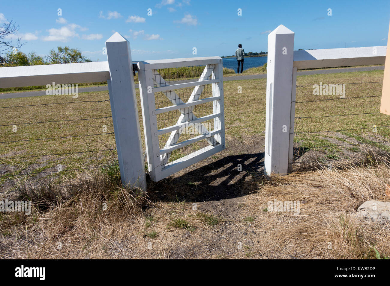 Coastal train line with gate to the ocean. Queenscliff, Victoria Stock ...