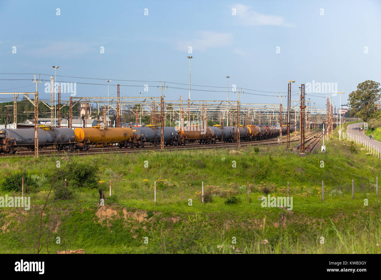 Train with cargo pulls into station transporting jet fuel tankers Stock ...