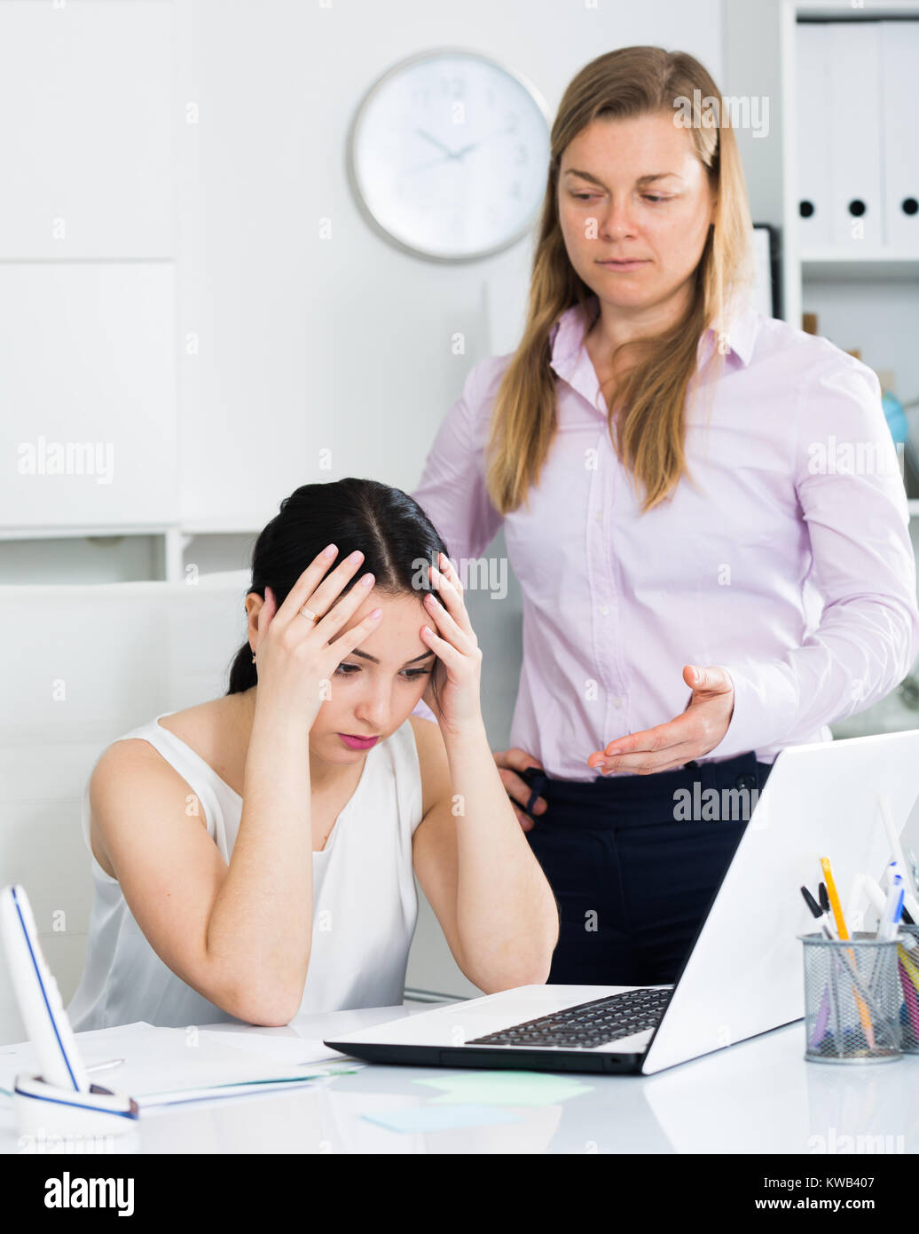Conflict in office between female senior manager and woman worker Stock ...