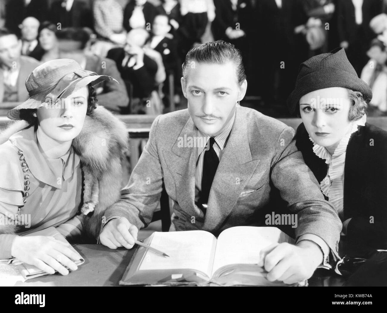 THE CASE OF THE HOWLING DOG, from left: Helen Trenholme, Warren William ...