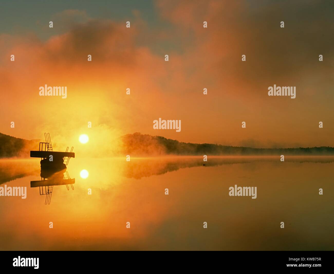 Jumping stone in water and foot trails in beach sand. The coastline in ...