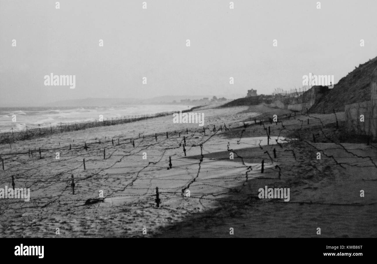 German barbed wire obstacles on the beach at Franceville, Brittany ...