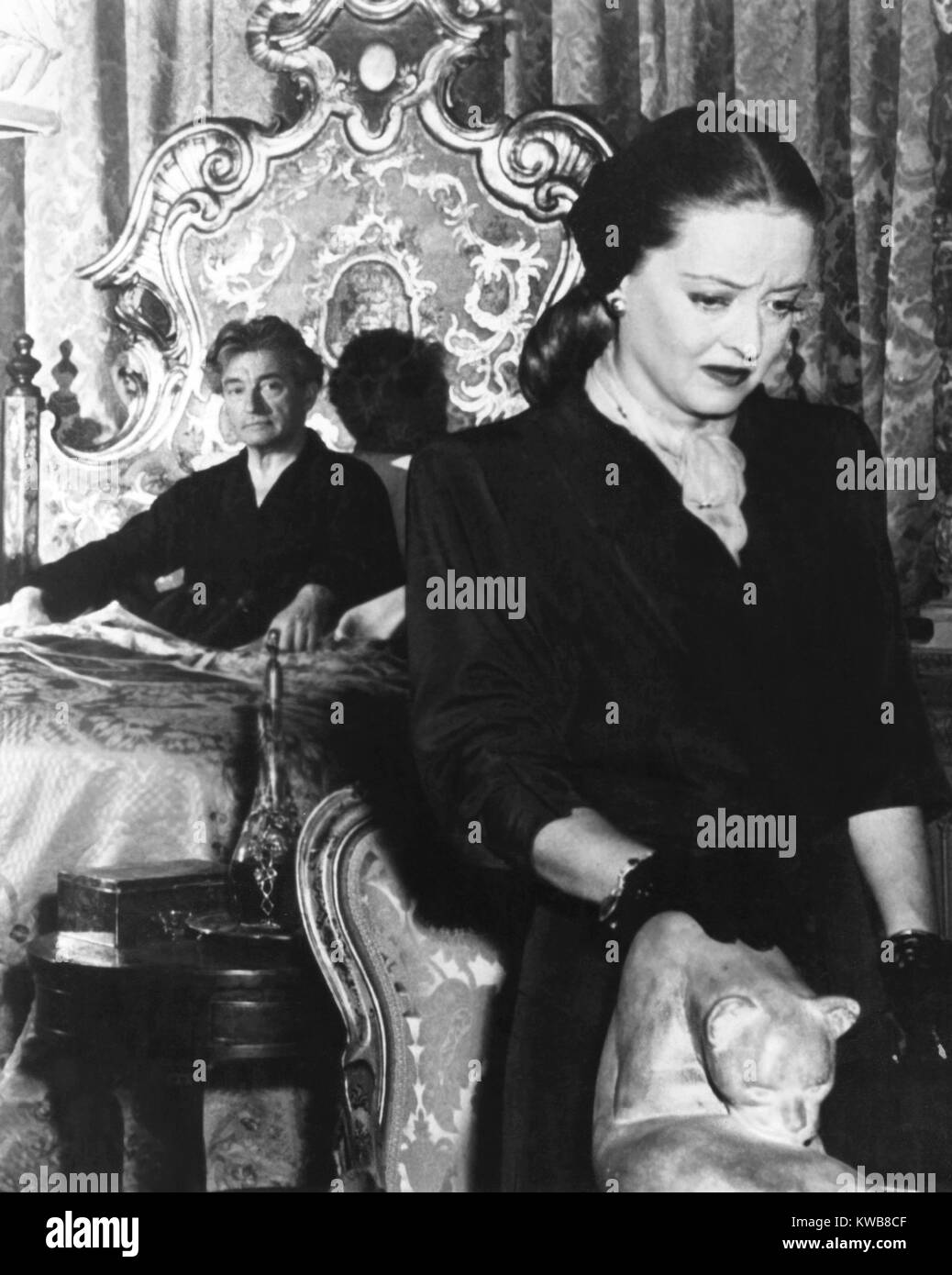 DECEPTION, from left: Claude Rains, Bette Davis, 1946 Stock Photo - Alamy