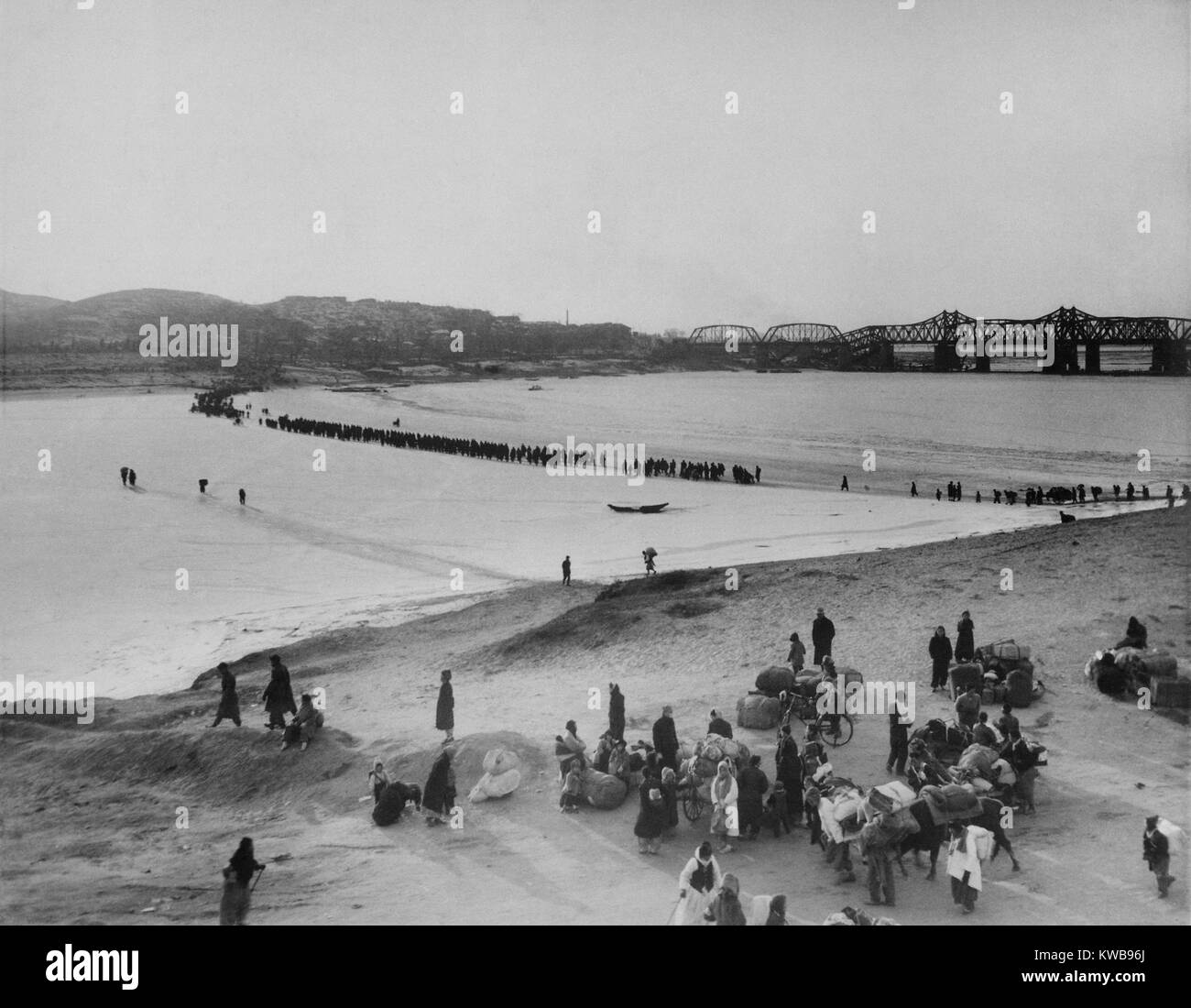Korean refugees streaming across the frozen Han River. They are fleeing ...