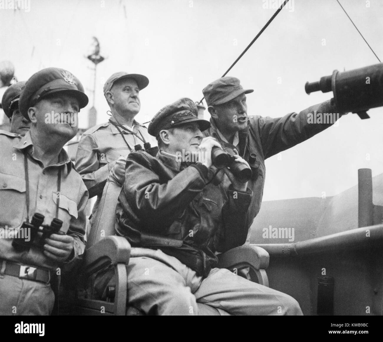 U.S. Commanders observe the shelling of Inchon, Korea, from the U.S.S ...