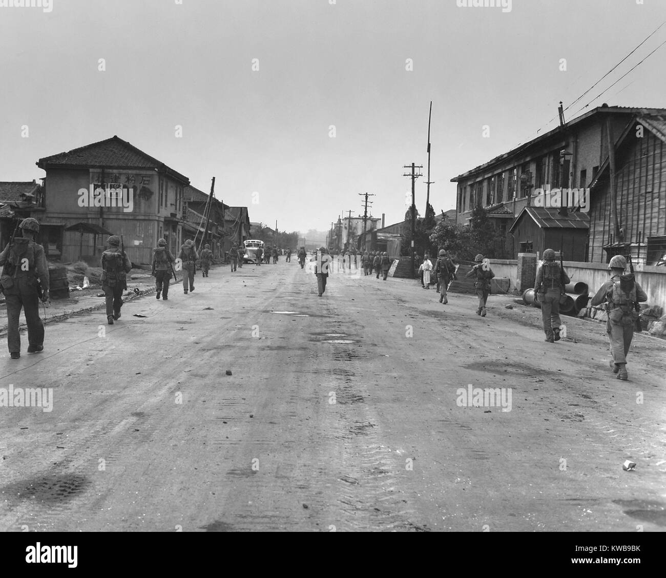 Korea Marines pass through Inchon with little resistance from the North ...