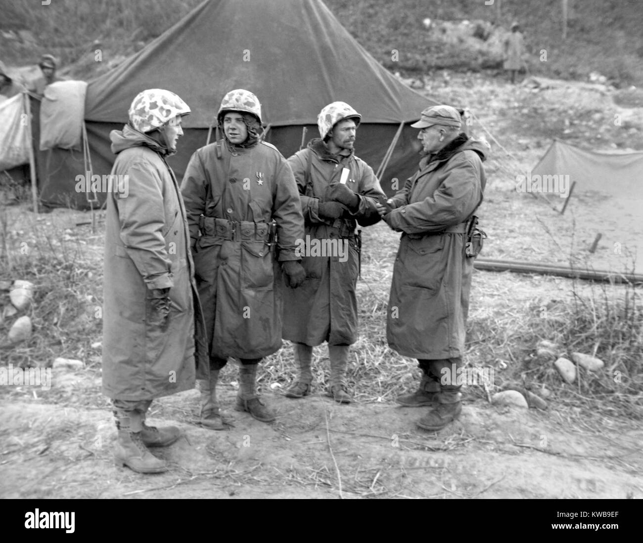 U.S. Marines are decorated in a brief front lines ceremony for ...