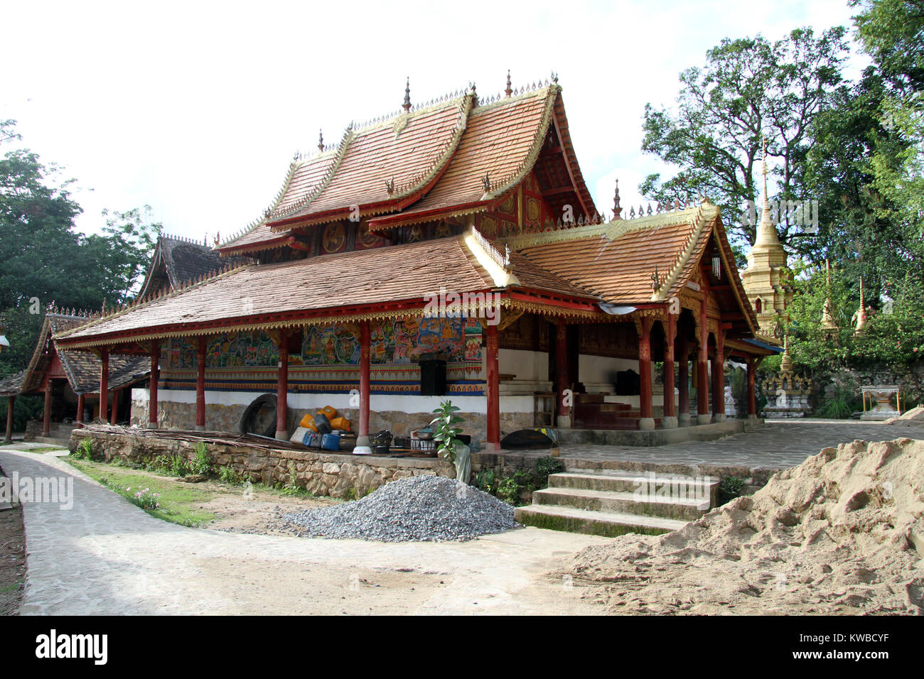 Old chinese buddhist temple in village Stock Photo - Alamy