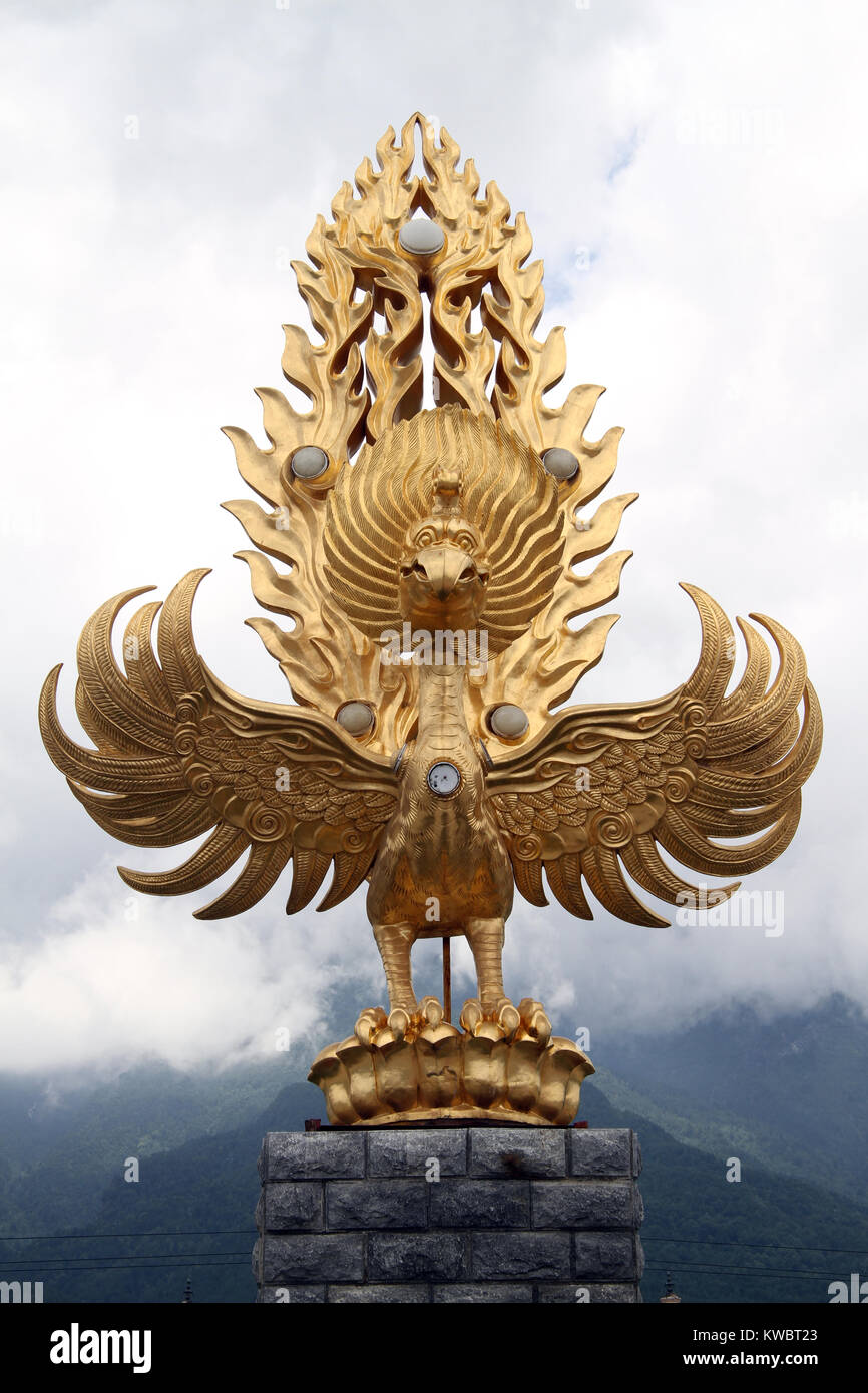 Golden buddhist bird Garuda in Dali, China Stock Photo - Alamy