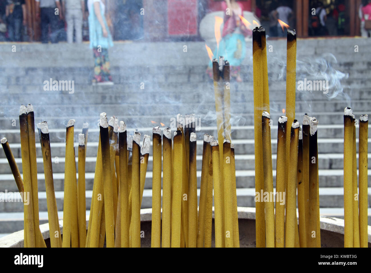 Burn buddhist sticks near facade of temple in Dali, China Stock Photo ...