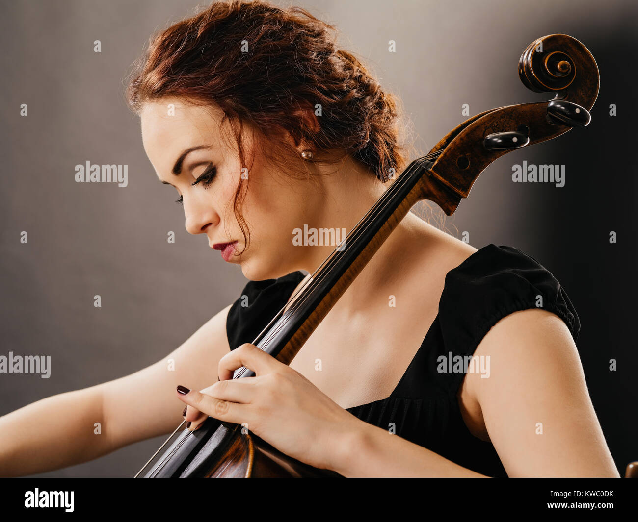 Woman playing a cello hi-res stock photography and images - Alamy
