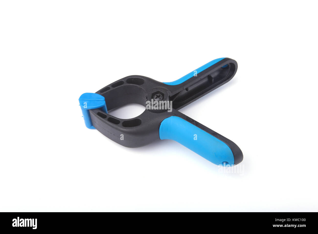 Black plastic spring clamp isolated on white background Stock Photo - Alamy