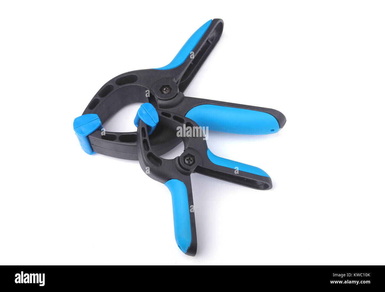 Black plastic spring clamp isolated on white background Stock Photo - Alamy