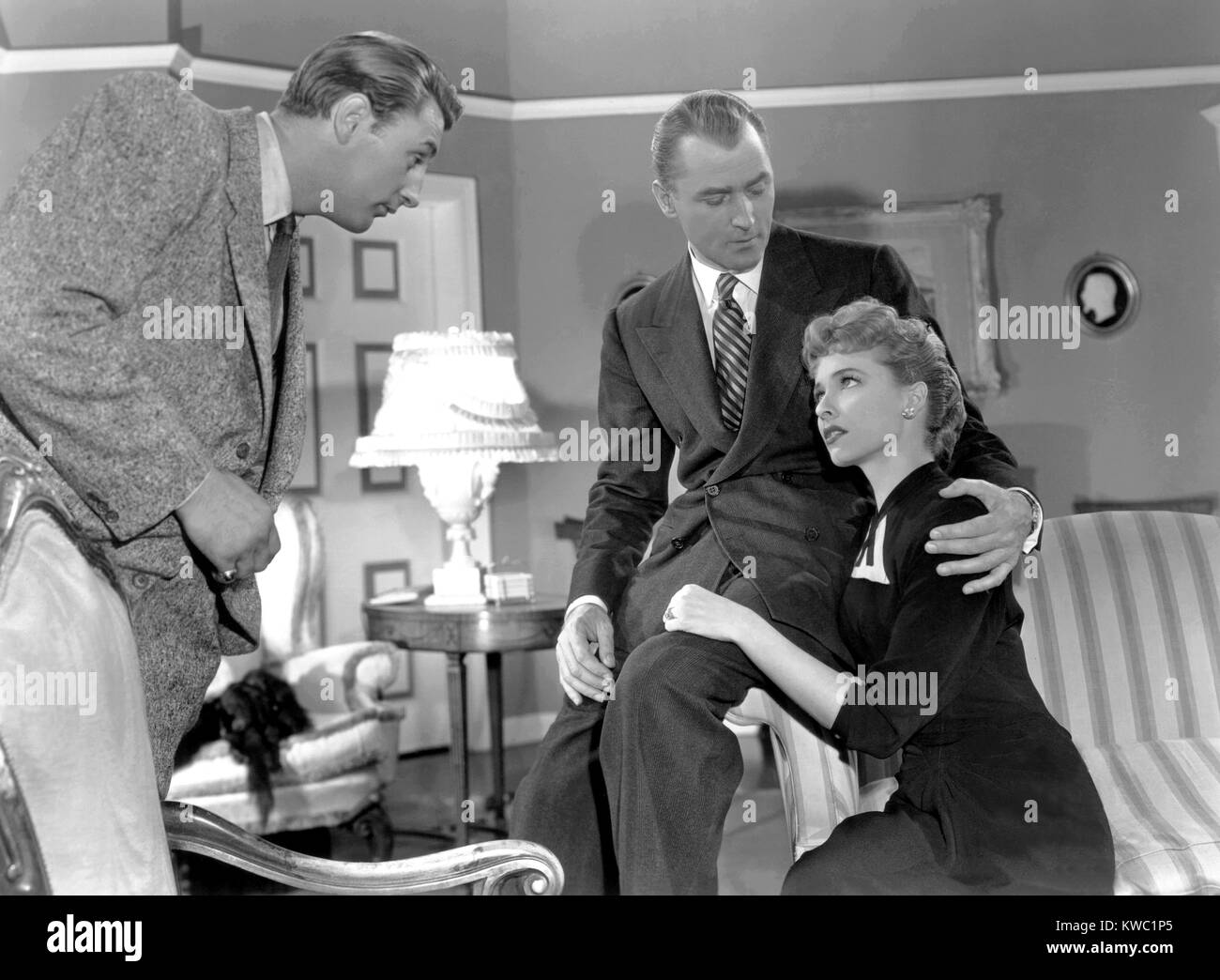THE LOCKET, from left, Robert Mitchum, Brian Aherne, Laraine Day, 1946 ...
