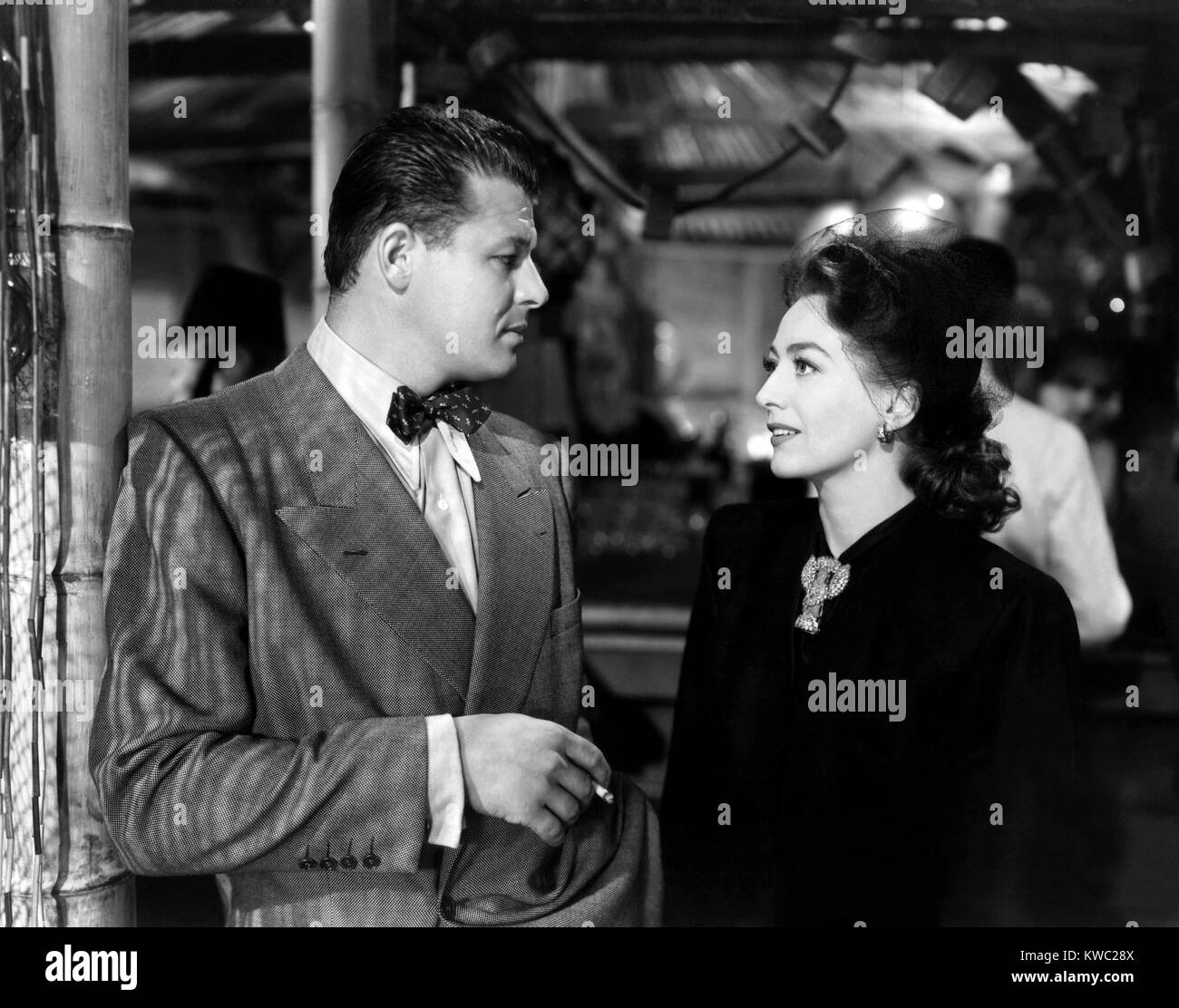 MILDRED PIERCE, from left, Jack Carson, Joan Crawford, 1945 Stock Photo ...