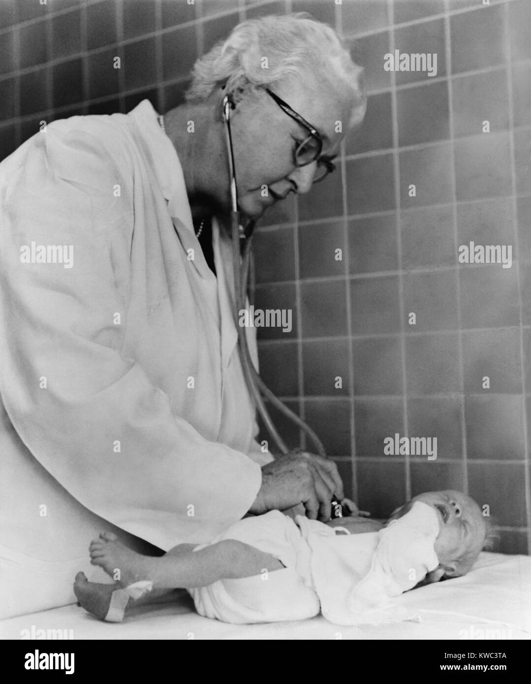 Dr. Virginia Apgar examining a newborn baby with stethoscope, Oct. 2 ...