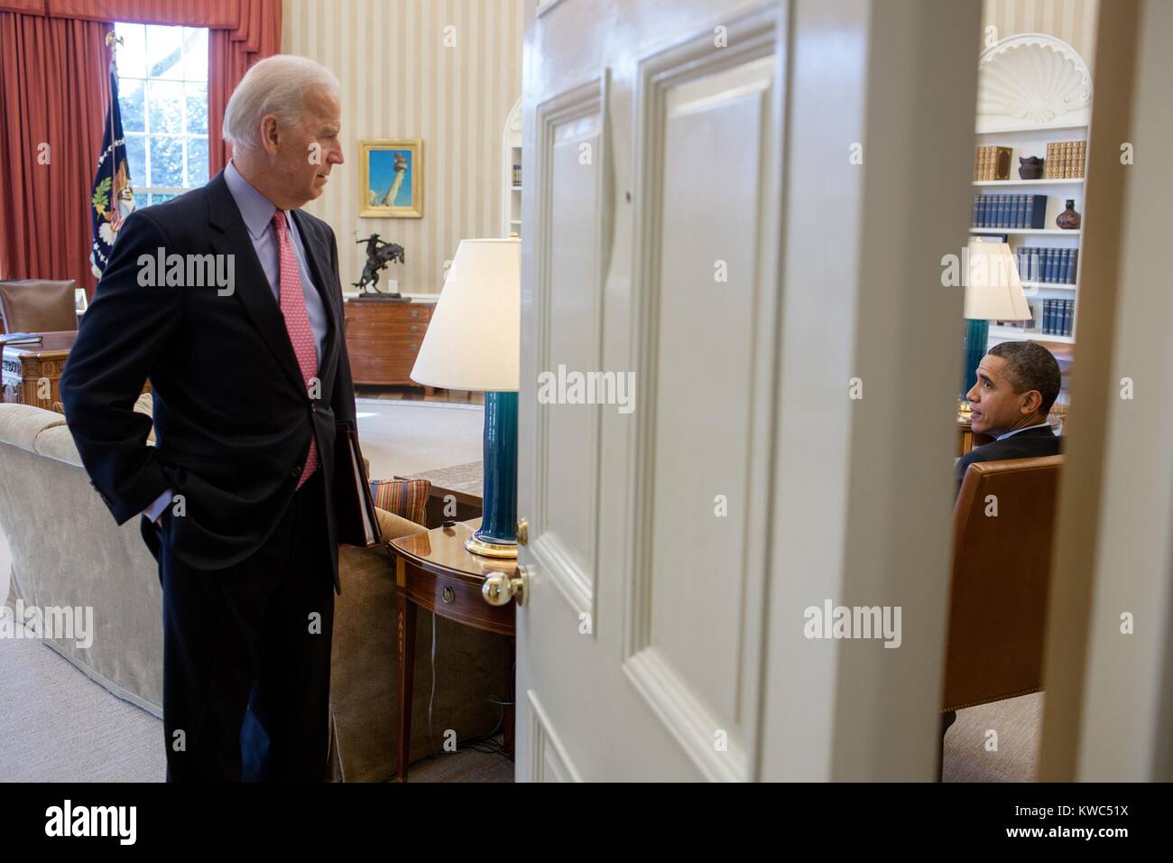 President obama talking with joe biden hi-res stock photography and ...