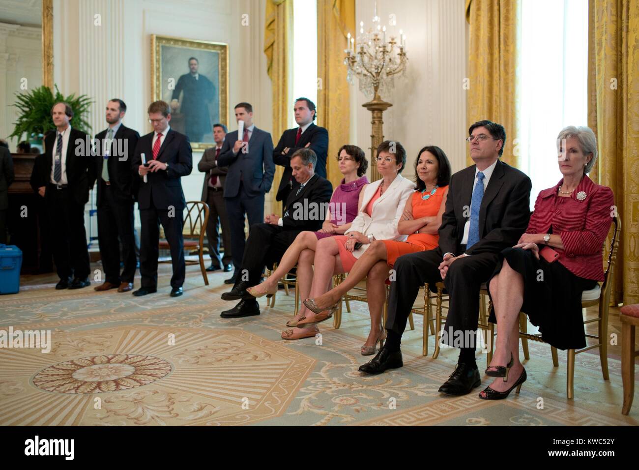 President Obama's staff listen as he broadcasts remarks about Supreme ...