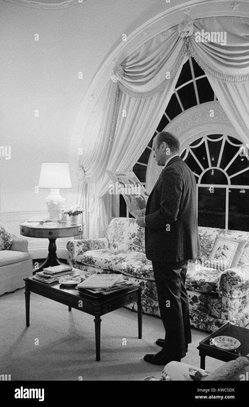 President Gerald Ford reading the newspaper in the living quarters of ...