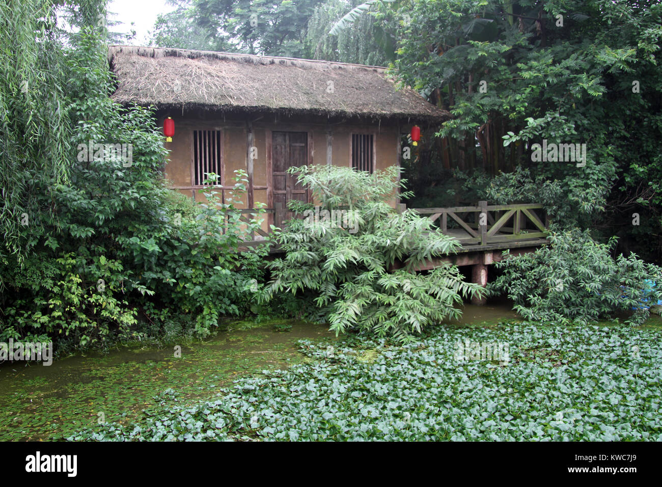 Smal building near the lake in park, Chengdu, China Stock Photo - Alamy