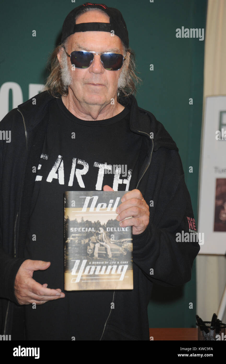 NEW YORK, NY - OCTOBER 14: Neil Young signs copies of his new book ...