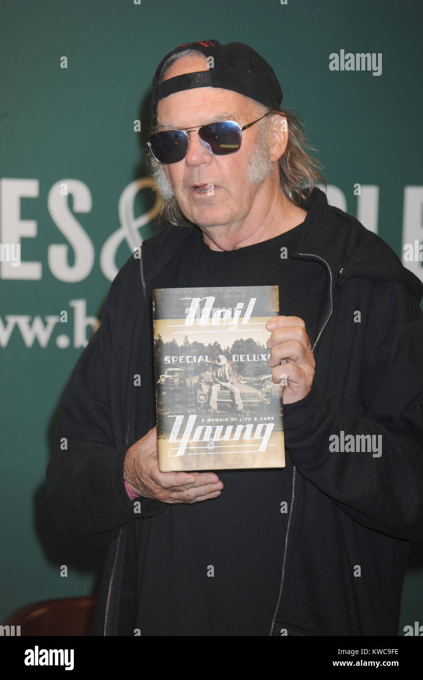NEW YORK, NY - OCTOBER 14: Neil Young signs copies of his new book ...
