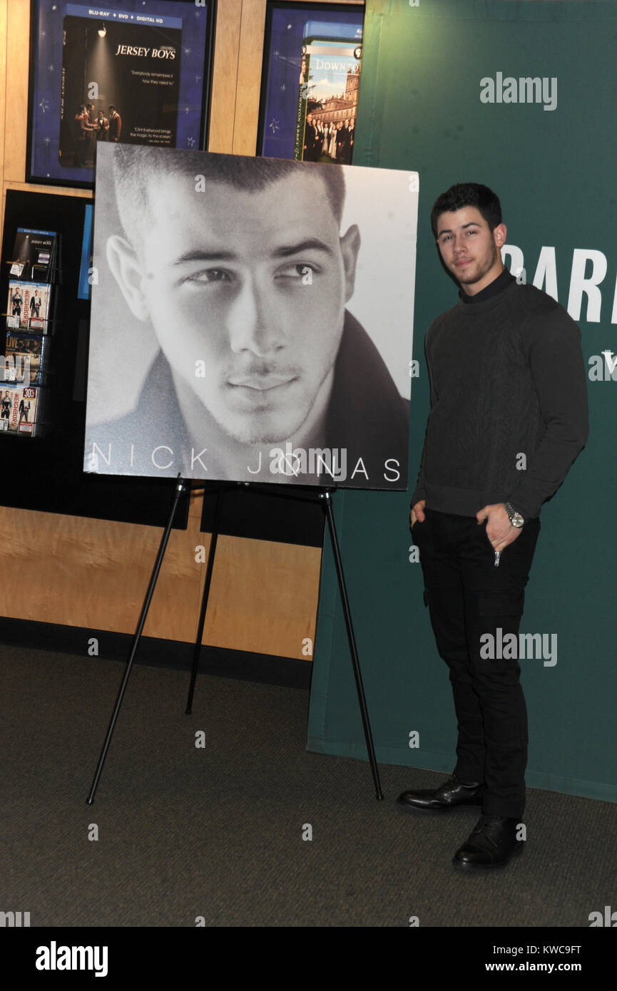 NEW YORK, NY - NOVEMBER 18: Singer Nick Jonas signs copies of his new ...