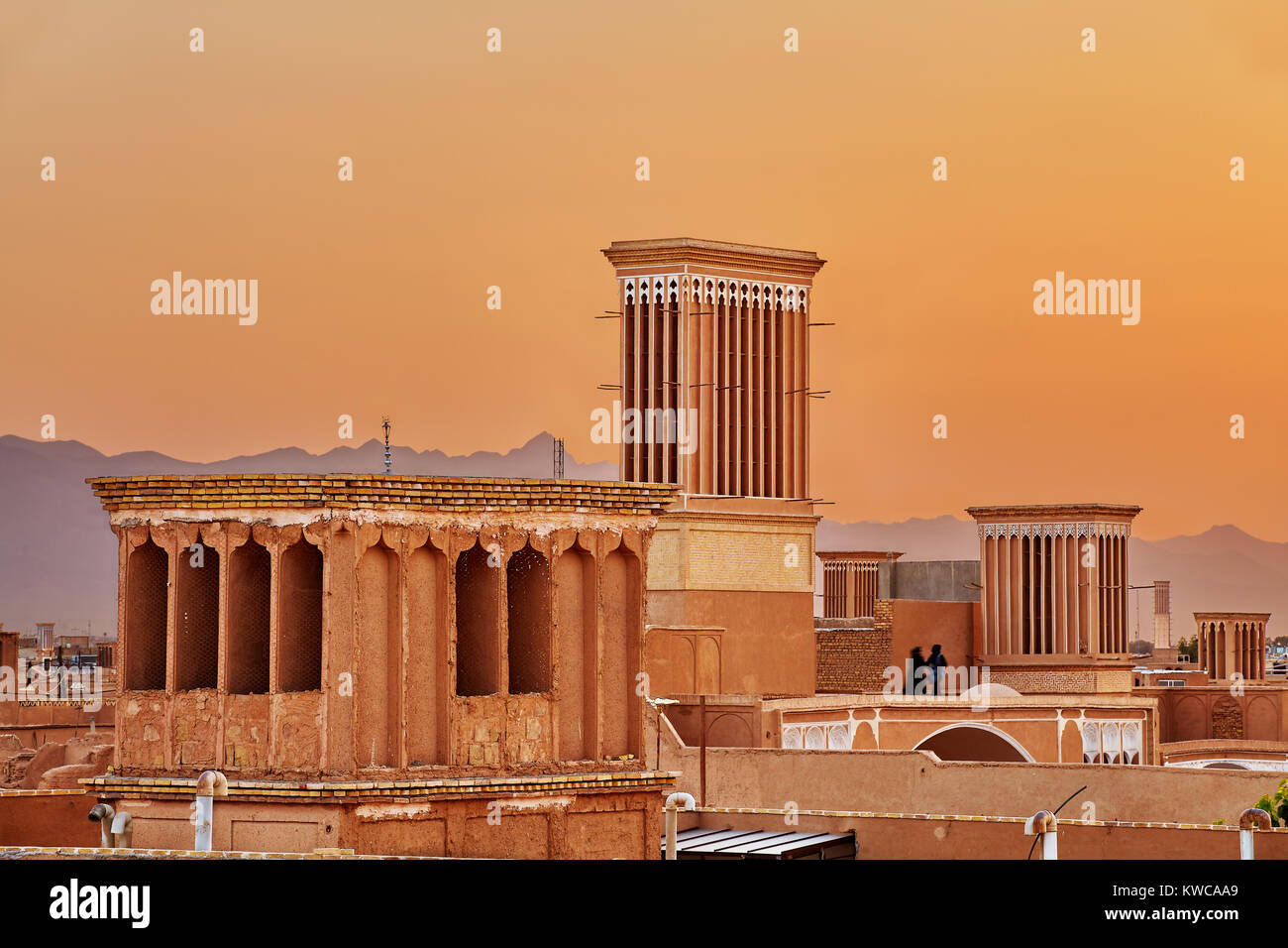 View of the center city Yazd in Iran at sunset, the Persian tower ...