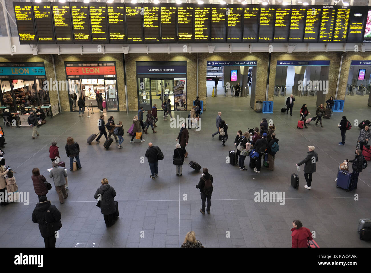Commuters at Kings Cross Station in London, as rail passengers ...