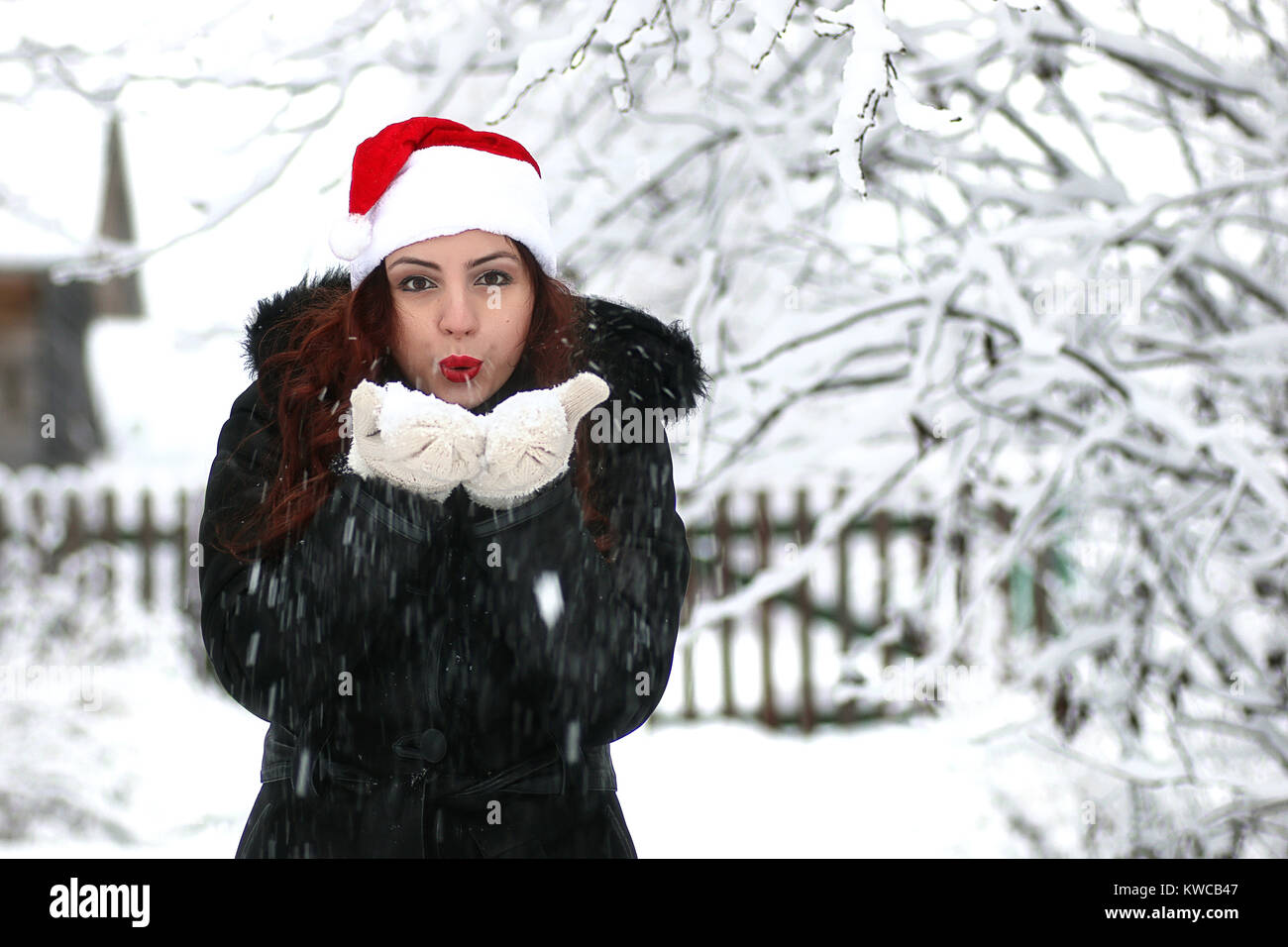 Beautiful girl in winter snowy day outdoors Stock Photo - Alamy