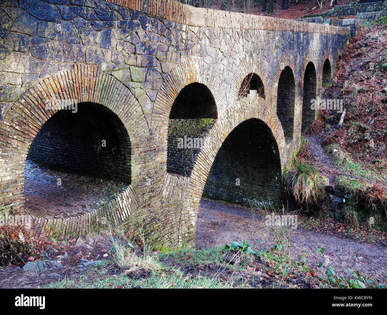 Looking along the seven arch bridge in the gardens of Rivington Pike ...