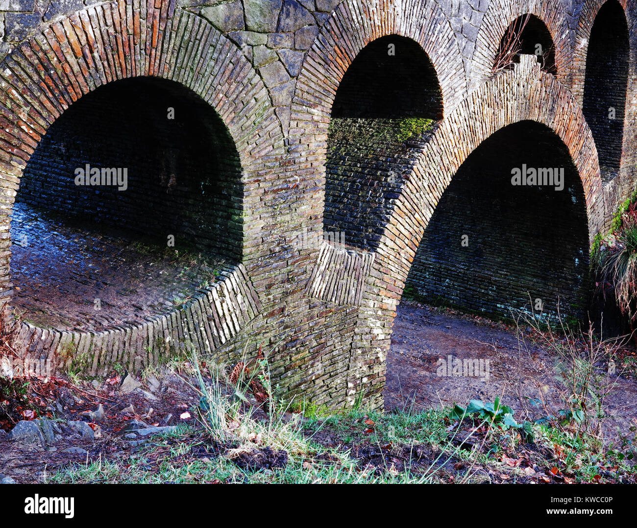 An abstract view of the seven arch bridge in Rivington gardens, at ...