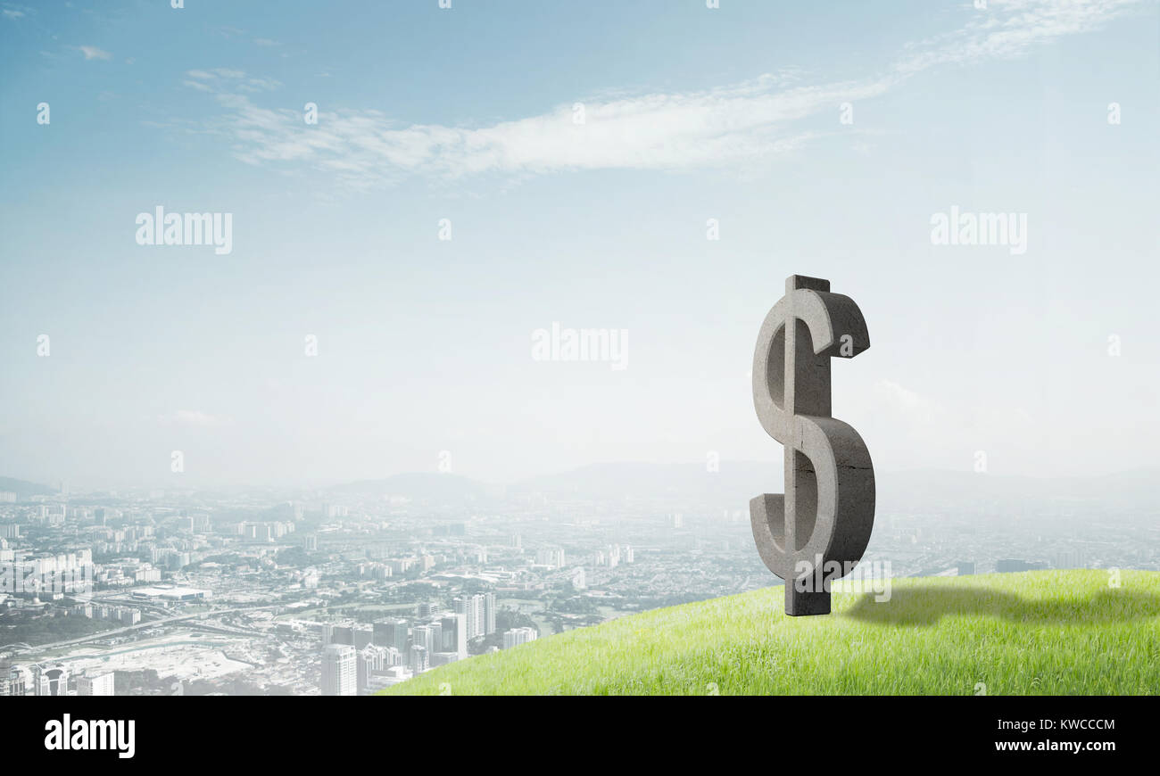 Stone dollar symbol outdoors on green hill as currency sign Stock Photo ...