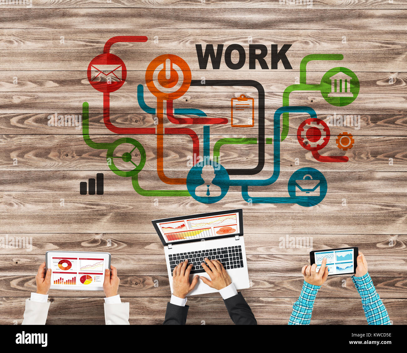 Group of three people with devices in hands working together as symbol ...